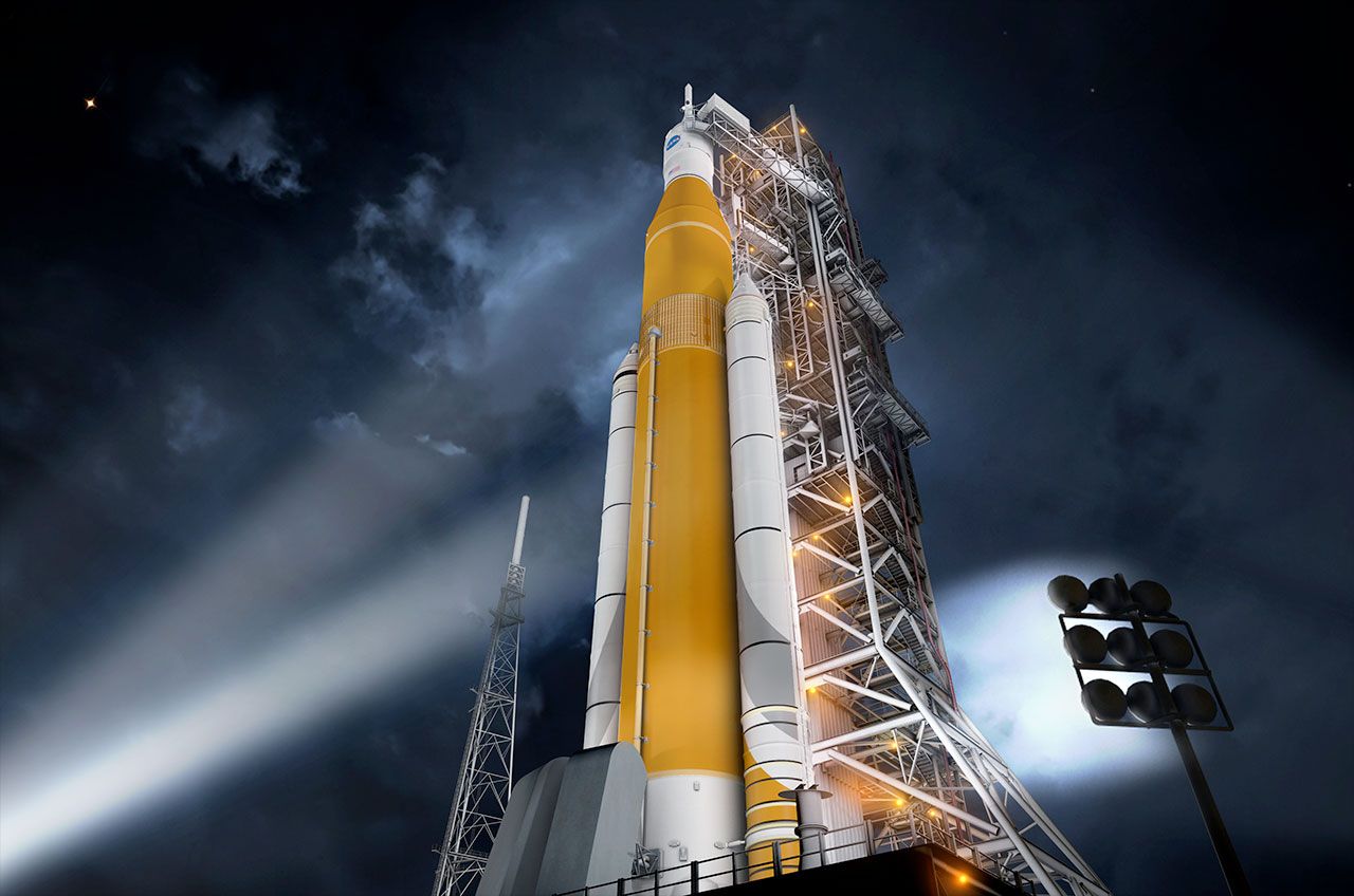 NASA's SLS Rocket Sheds Saturn V Color Scheme in Design Review | Space