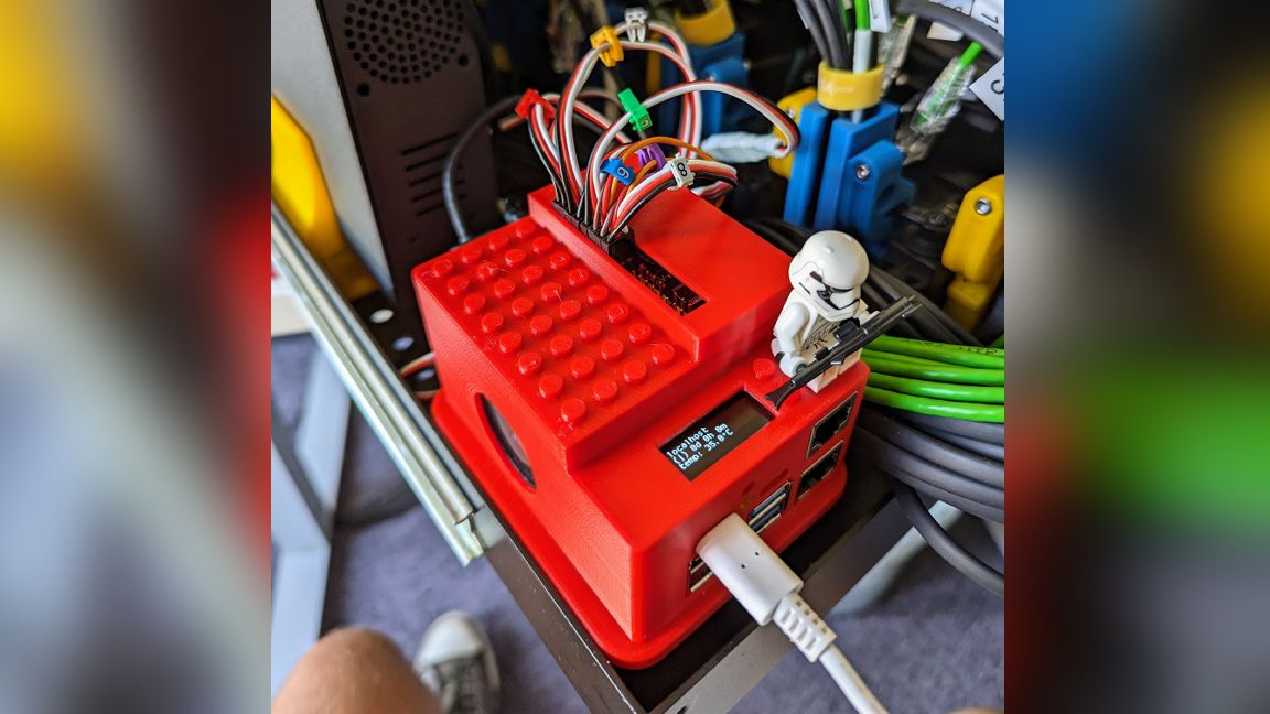 Raspberry Pi Kvm Powers On 16 Mac Minis With 8 Servos Toms Hardware