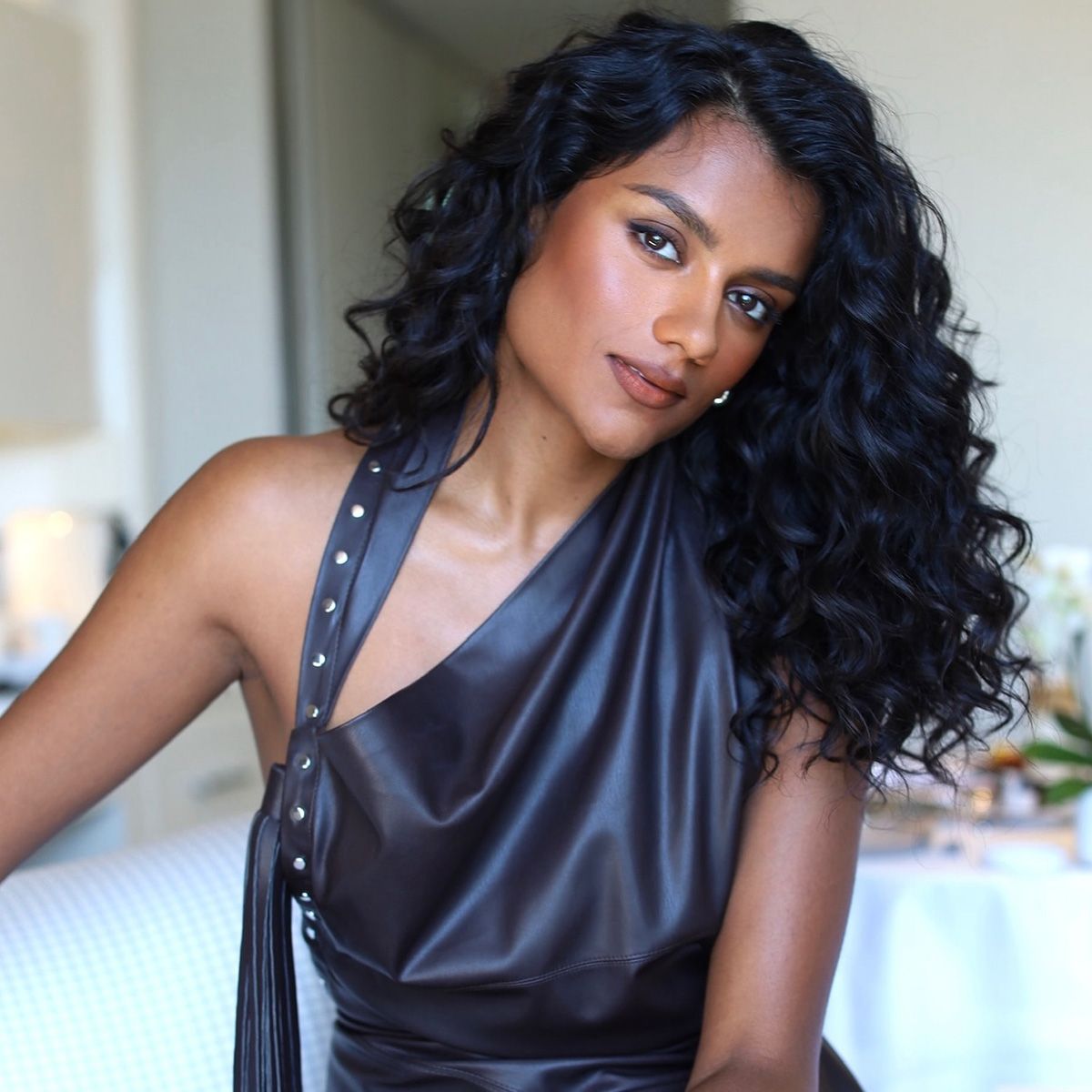 Simone Ashley's Beauty Secrets and What's in Her Makeup Bag | Who What Wear