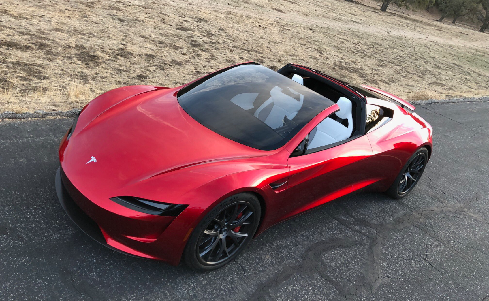 Tesla unveils electric sports car as semi truck makes debut | The Week