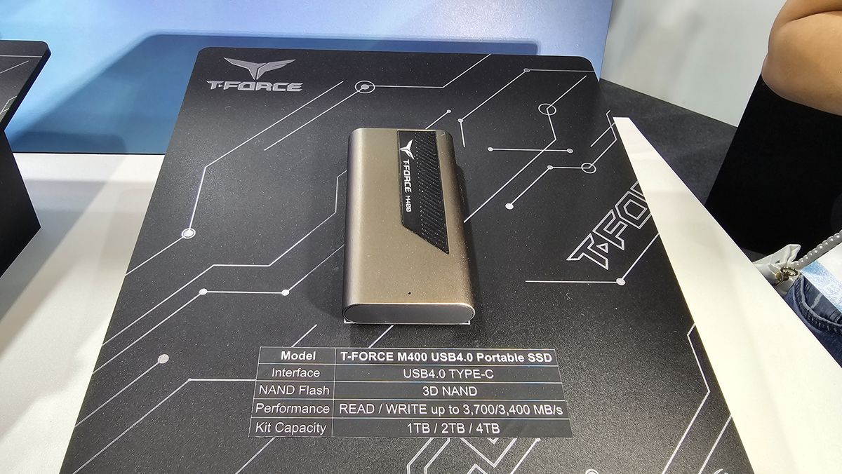 Team Group shows off new PCIe 5.0 SSDs for AI, SSD coolers, and a Portable SSD with a Bluetooth ...