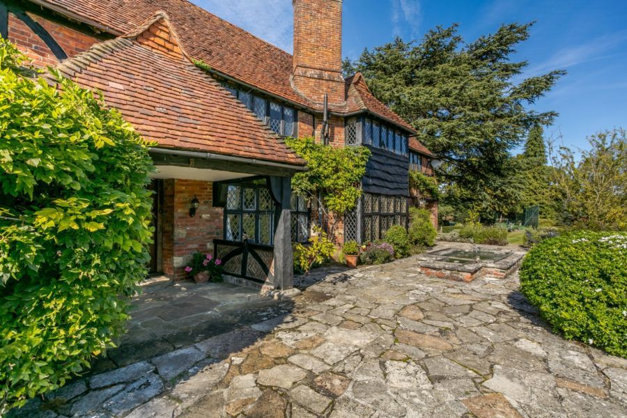 A beautiful medieval-style house and estate in the heart of Surrey's ...