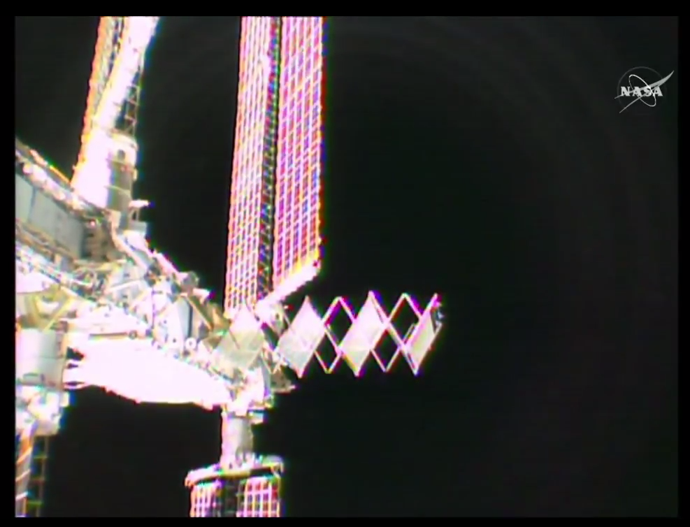 Successful Spacewalk! NASA Astronauts Reel in Radiator, Install New ...