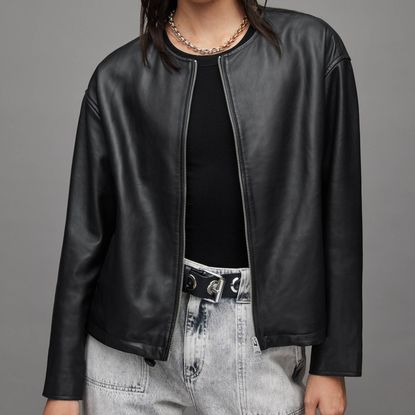 We love Victoria Beckham's black flares and leather jacket combo ...