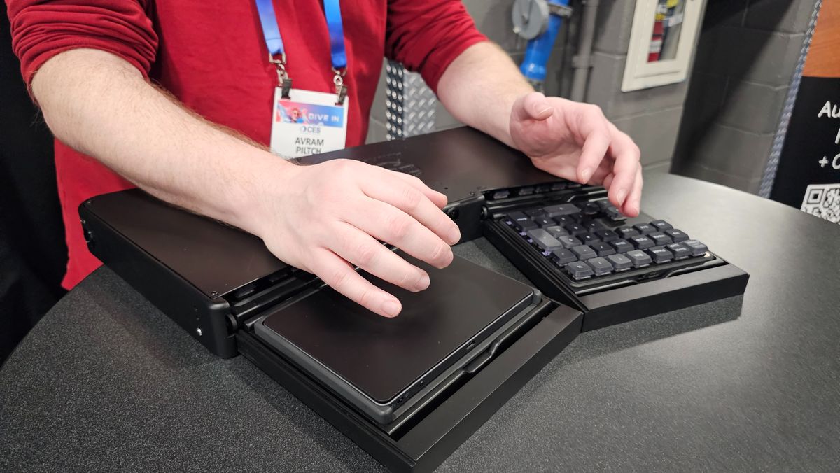 Raspberry Pi 5 powers motorized keyboard that changes layout based on ...