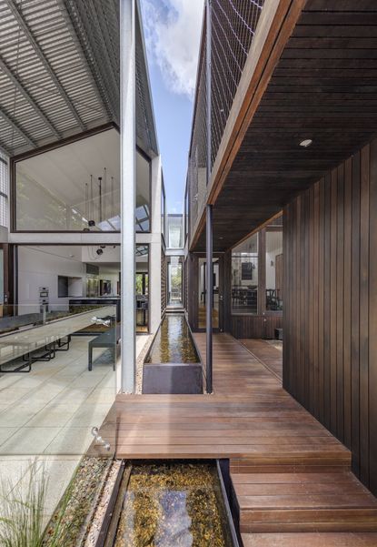 See why this Australian home – with internal ponds and 'rivers' – has ...