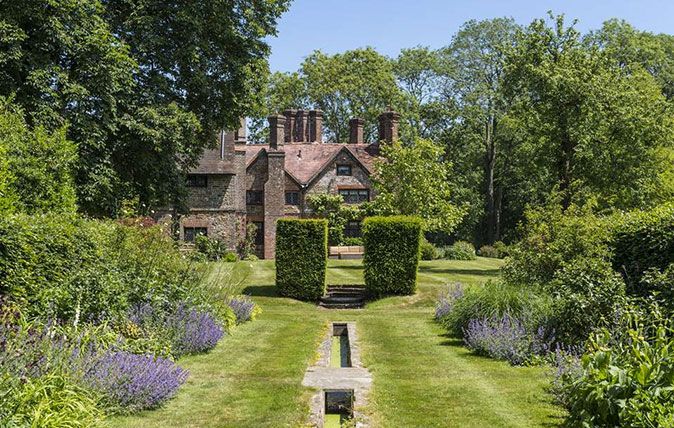 A magnificent Surrey manor house that boasts gardens by Gertrude Jekyll ...