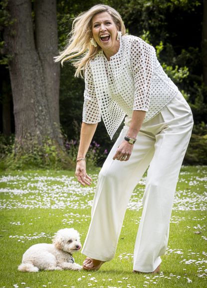 Queen Maxima gives us a masterclass in wearing white trousers | Woman ...