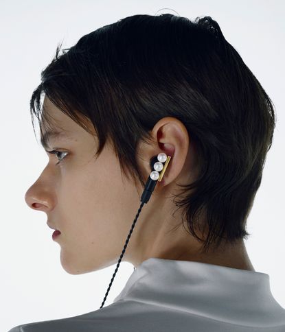Tasaki marks 70 years with pearl embellished trainers, earphones and ...