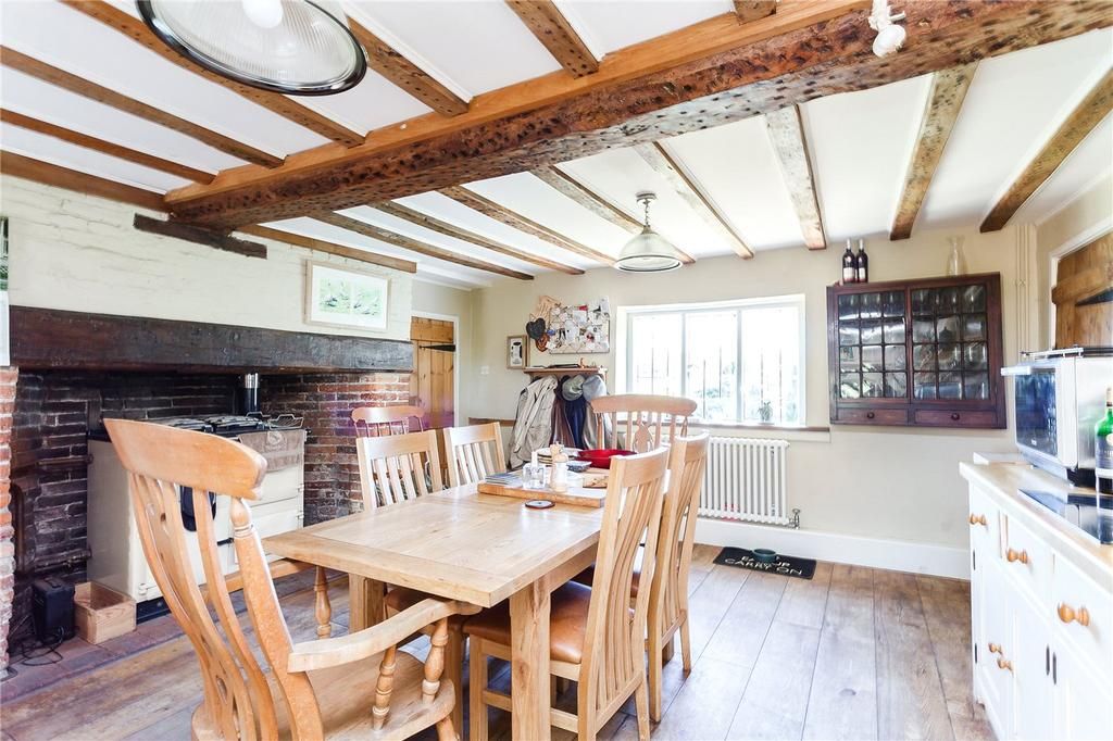 A stunning thatched home with beams, fireplaces and secret doors that ...
