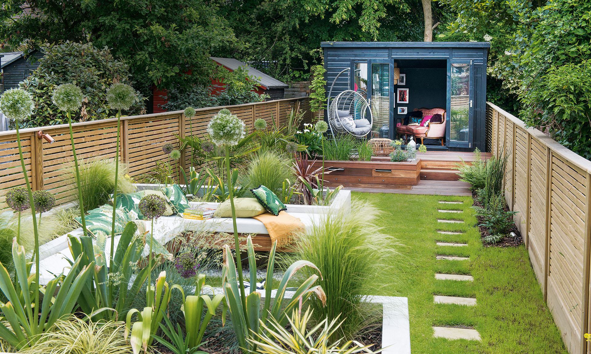 Multi-zoned garden makeover with raised beds, summerhouse and dining ...