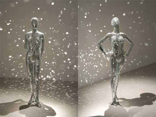 Magical mirror people shed light on consumerism | Creative Bloq