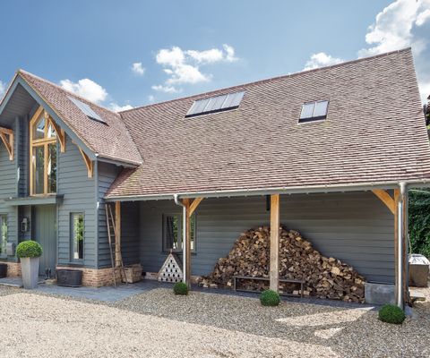 12 log store ideas for keeping your firewood dry and tidy | Homebuilding