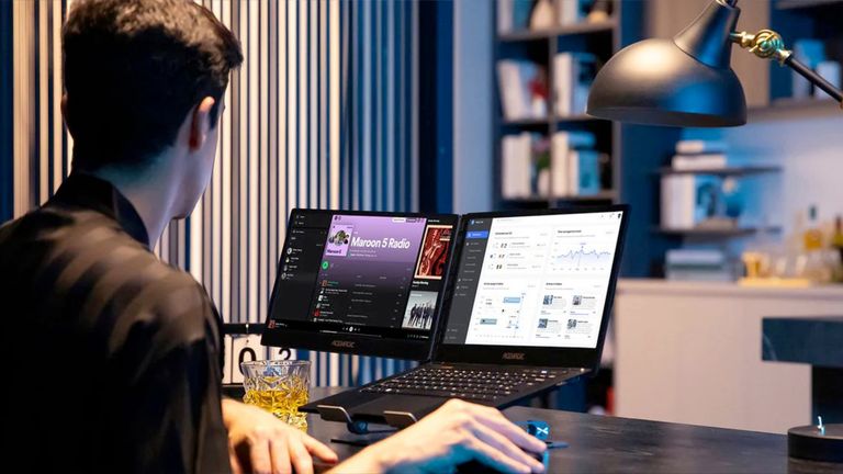 This crazy-cool laptop folds out sideways as well as up for 2 screens ...