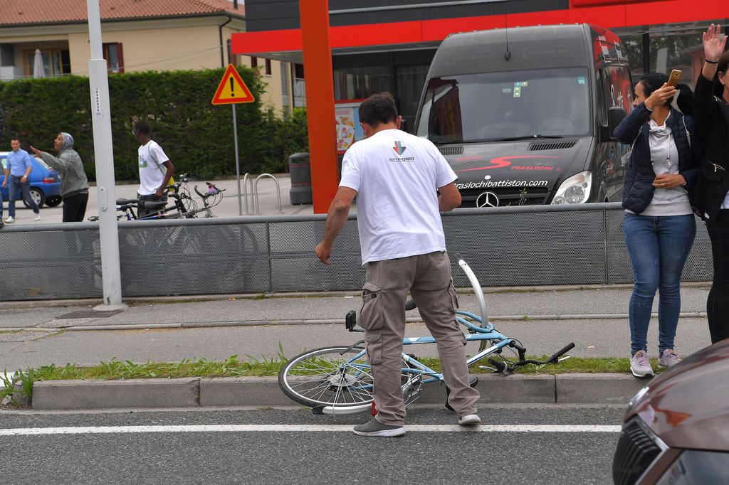 Watch: The moment a spectator throws a bike in front of riders at the ...