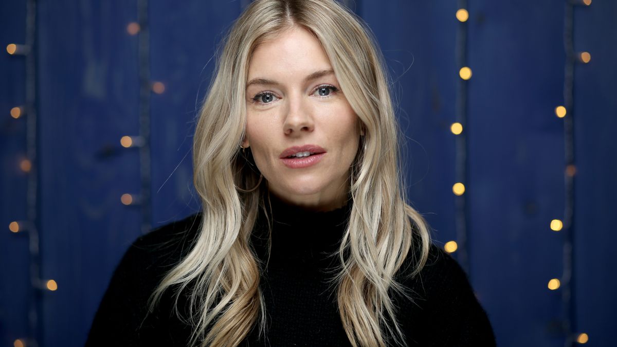 Sienna Miller's edgy snake print boots nail bold autumn dressing ...