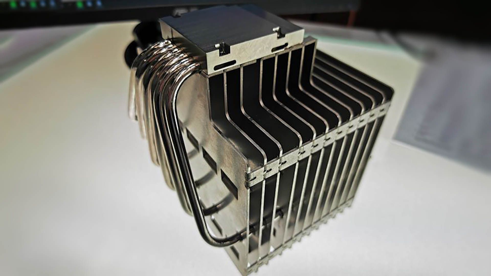 This fanless CPU cooler is an absolute unit, and also delayed until ...