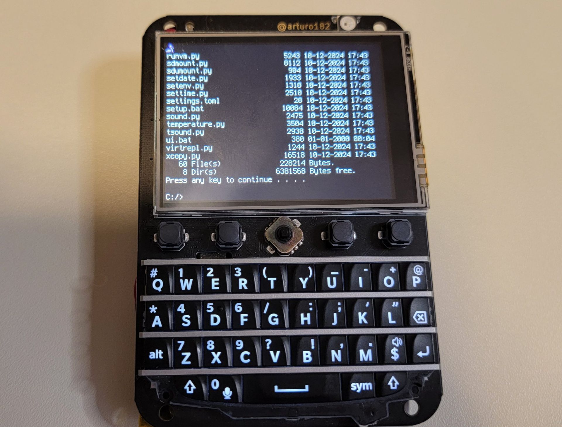 Maker builds Raspberry Pi RP2350 powered PyDOS handheld in a BlackBerry ...