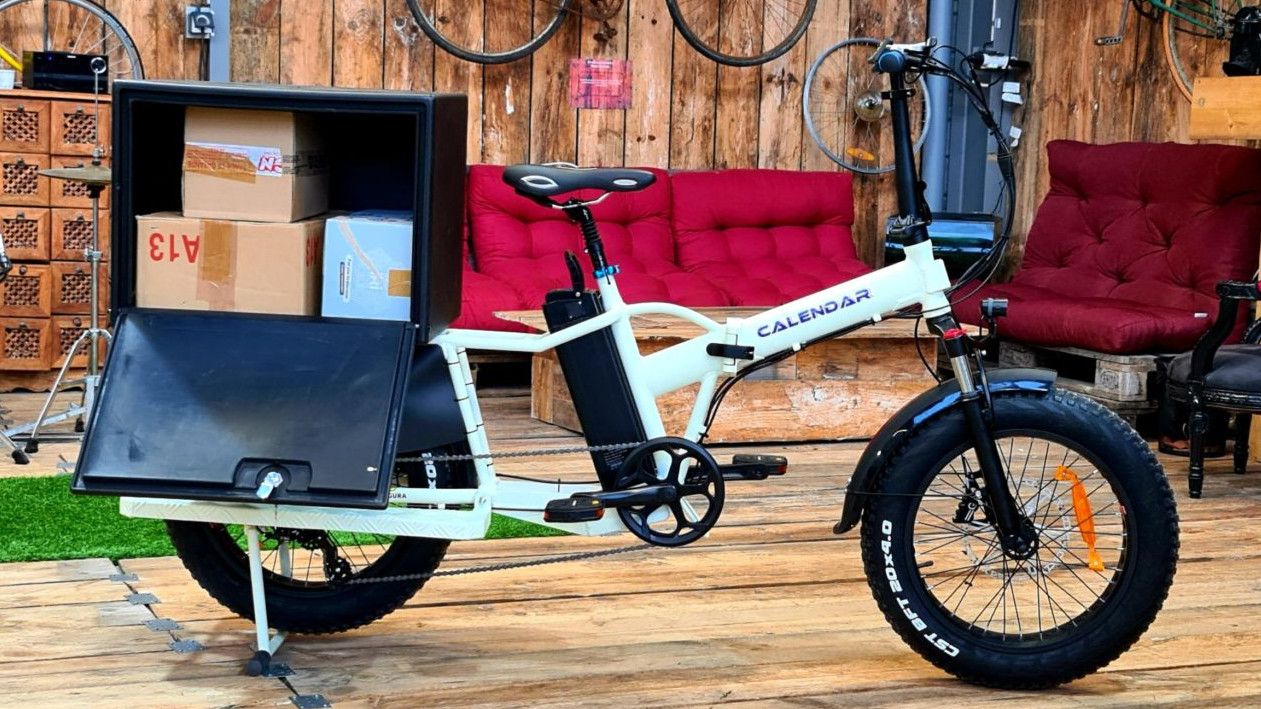 This funky glow-in-the-dark e-bike will help you stand out from the ...