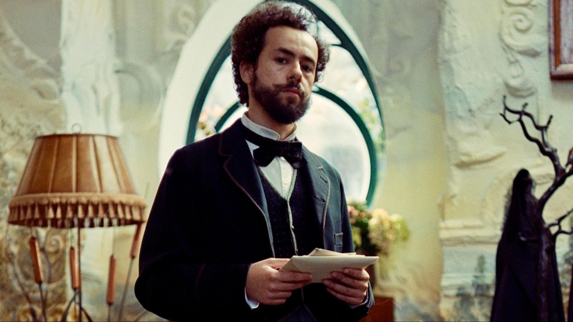 Poor Things' Ramy Youssef says the film "demands" to be watched in a ...