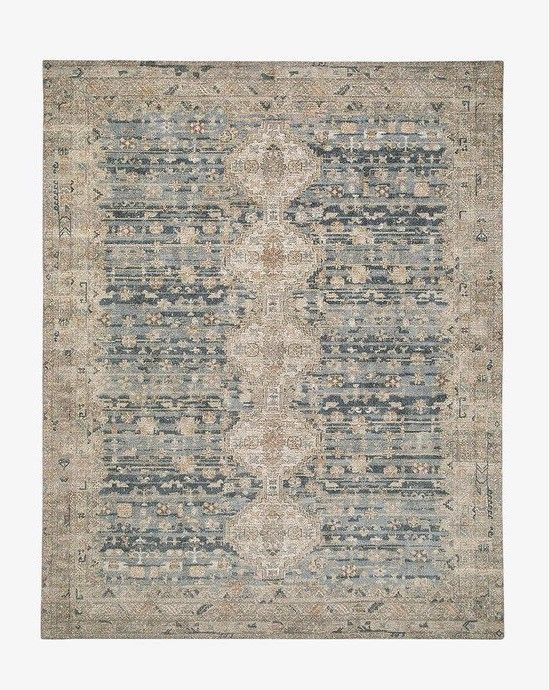 Shea McGee loves this rug hack to elevate the living room | Homes and ...