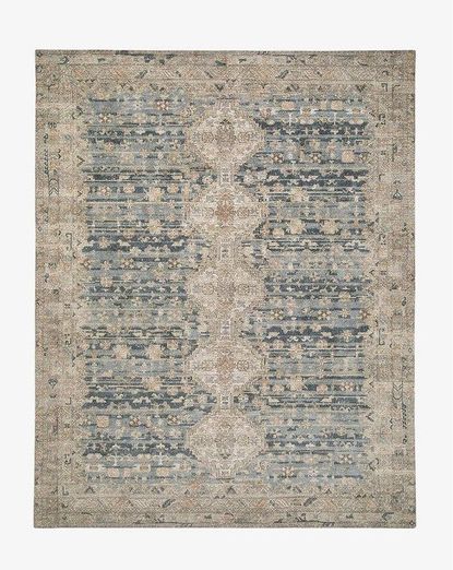 Shea McGee loves this rug hack to elevate the living room | Homes and ...