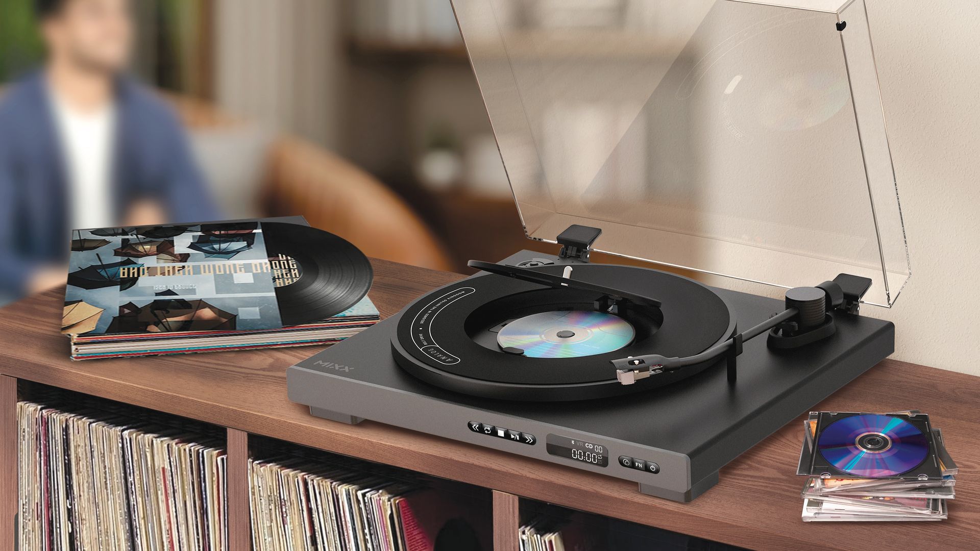 This 2-in-1 automatic turntable has an integrated CD player in a design ...