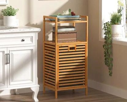How to fit a hamper in a small bathroom — the pros weigh in | Real Homes