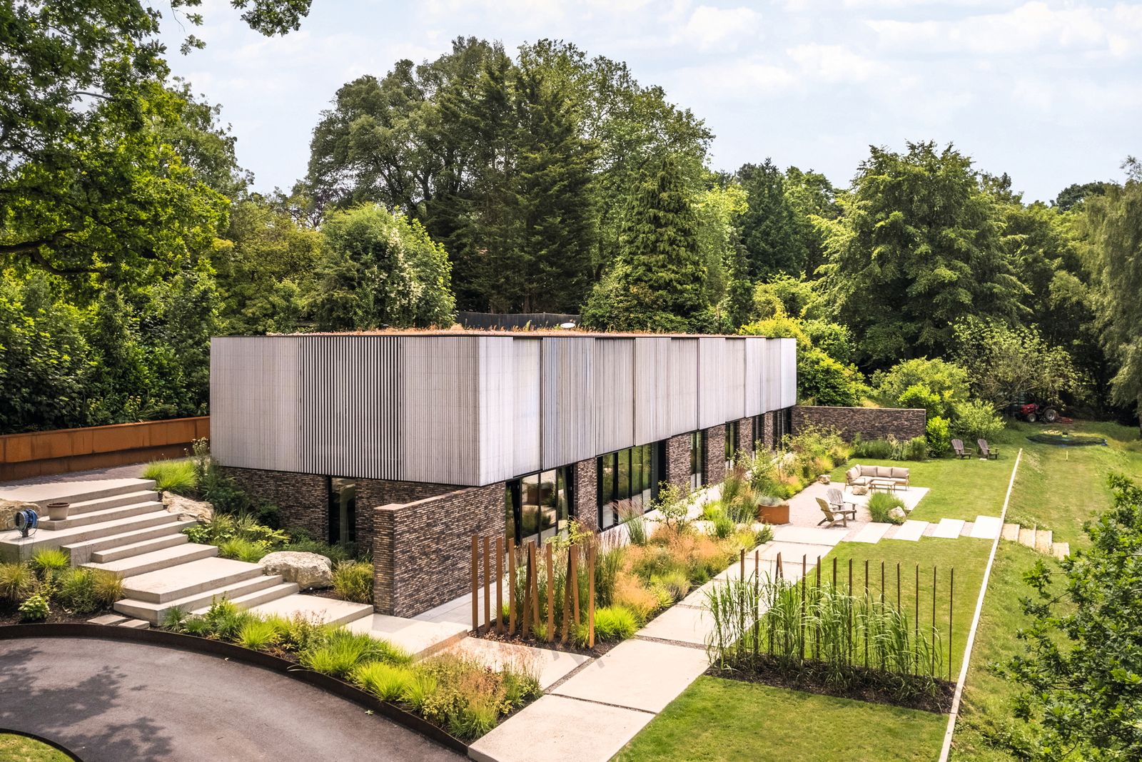 A Grade II-listed house in the Surrey Hills that was designed by Sir ...