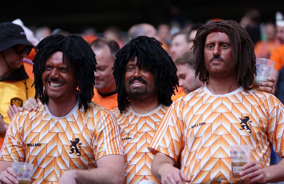 Netherlands legend Ruud Gullit reacts after Dutch fans accused of ...