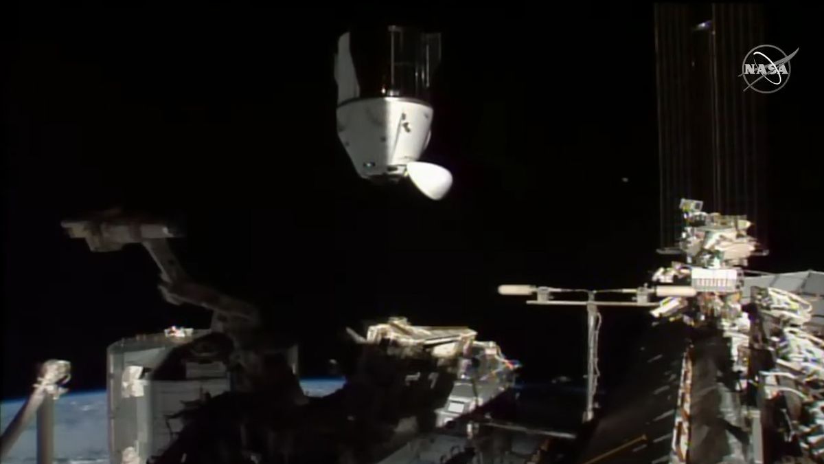 Astronauts move their SpaceX Dragon spaceship in orbit ahead of Boeing ...