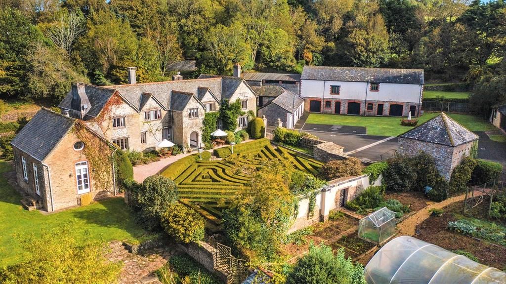A Grade II*-listed manor set in idyllic grounds in the South Hams ...