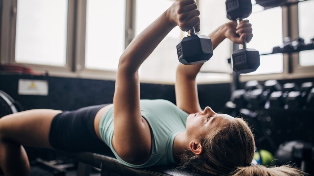 How To Do The Overhead Dumbbell Triceps Extension | Coach