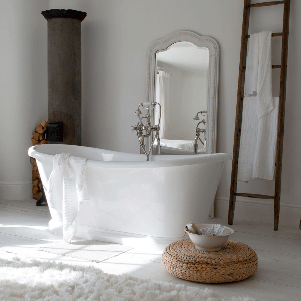 A quirky old rectory on numerous levels celebrates an all-white palette ...