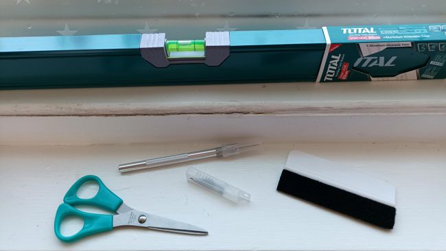 Installing window film: a quick easy way to add privacy | Homebuilding