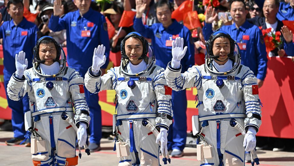Three Chinese astronauts stranded on Tiangong space station after debris hits their return ...