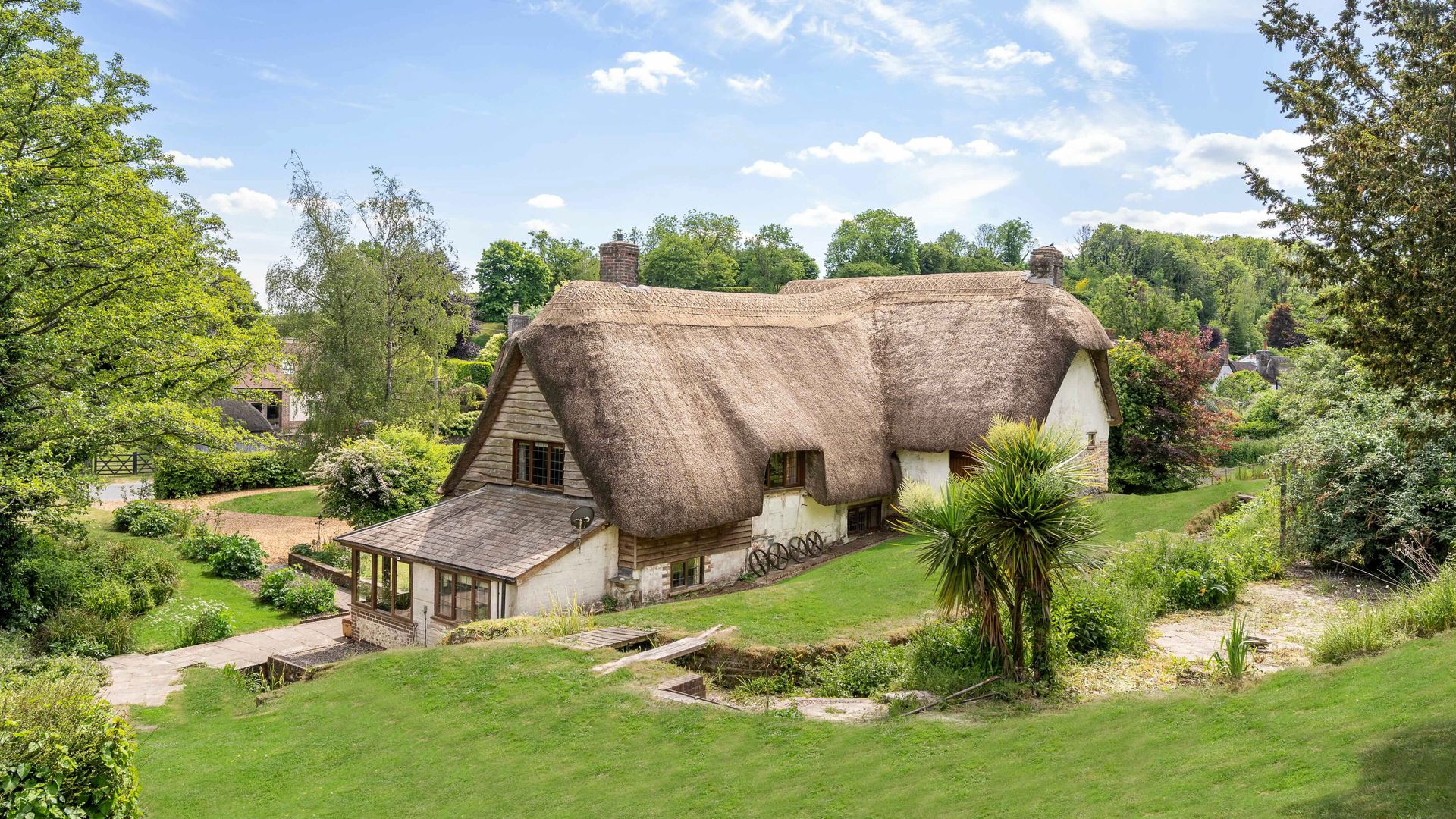 A picture-perfect thatched cottage tucked away in Dorset's Blackmore ...