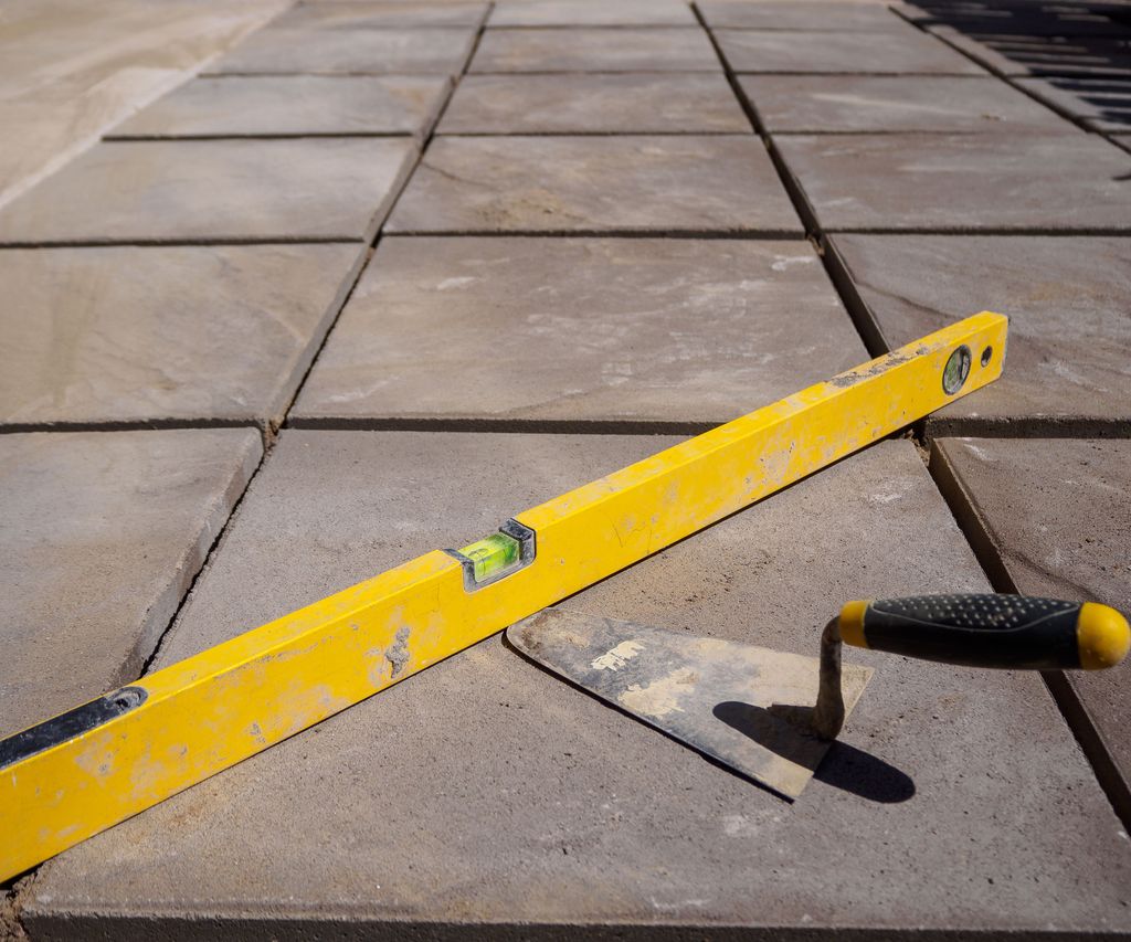 How to build a patio on a slope: expert tips to get it right | Homebuilding