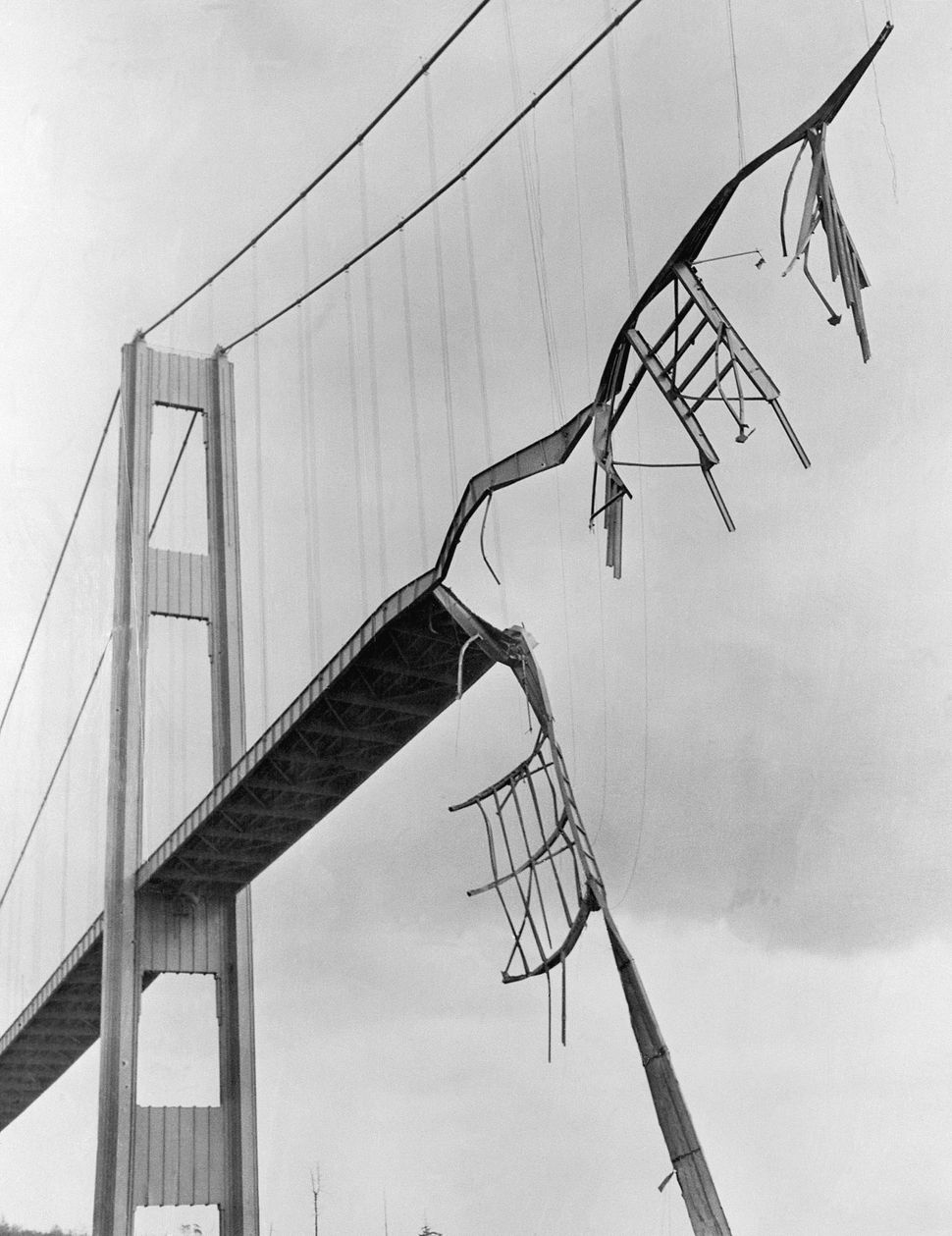 Science history: The Tacoma Narrows Bridge collapses, forcing a ...