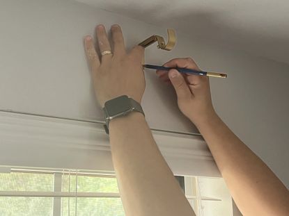 How to hang a curtain rod | Real Homes