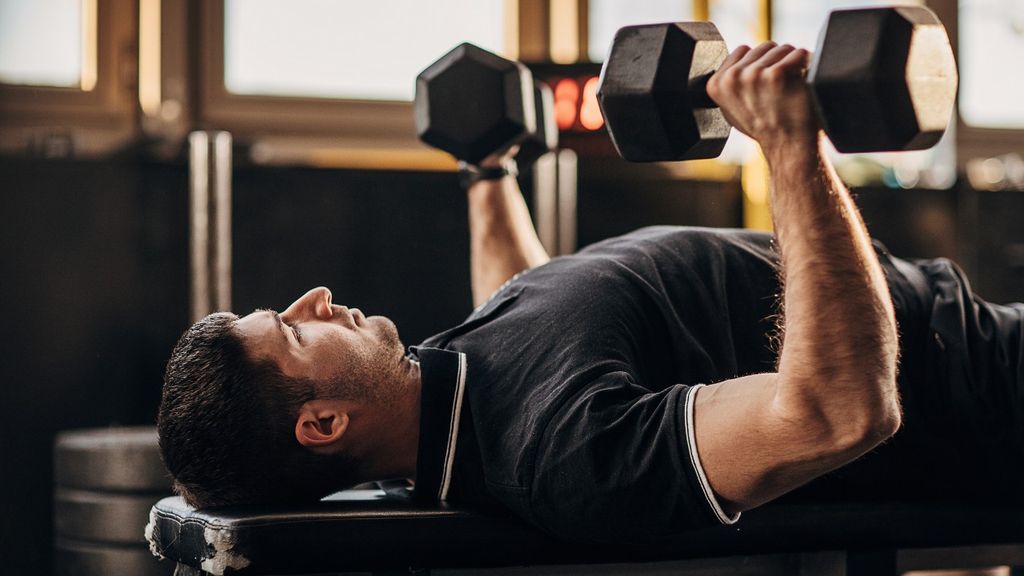 How To Do The Dumbbell Bench Press | Coach