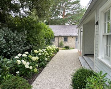 Landscaping with evergreens: 9 ways to use in garden design | Homes and ...