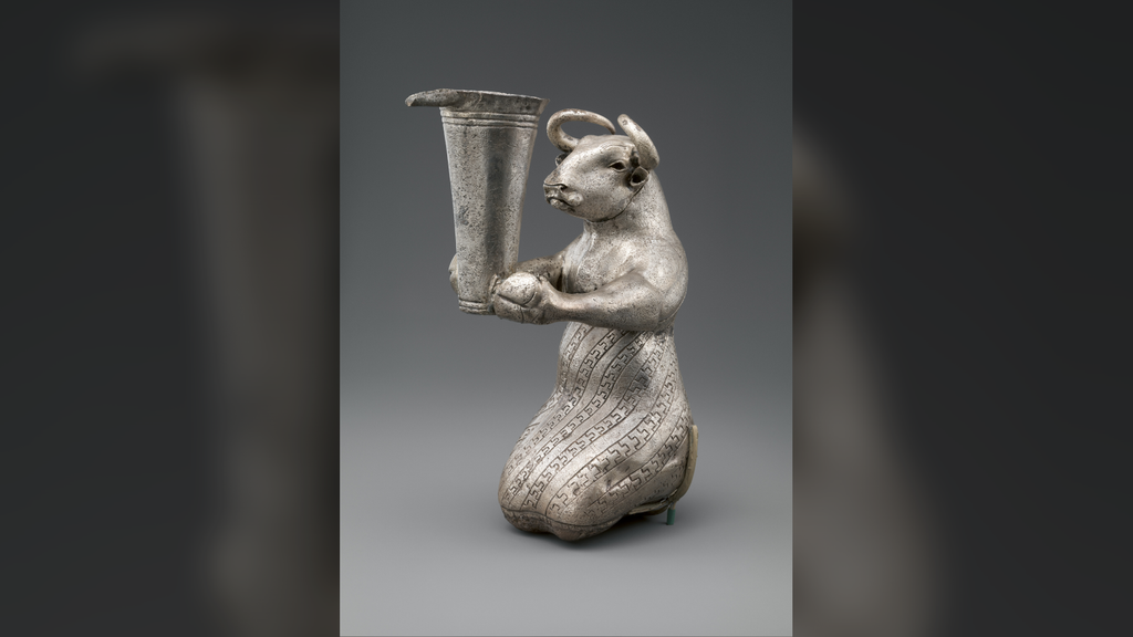 Kneeling Bull: A half-bull, half-human silver figurine from ancient ...