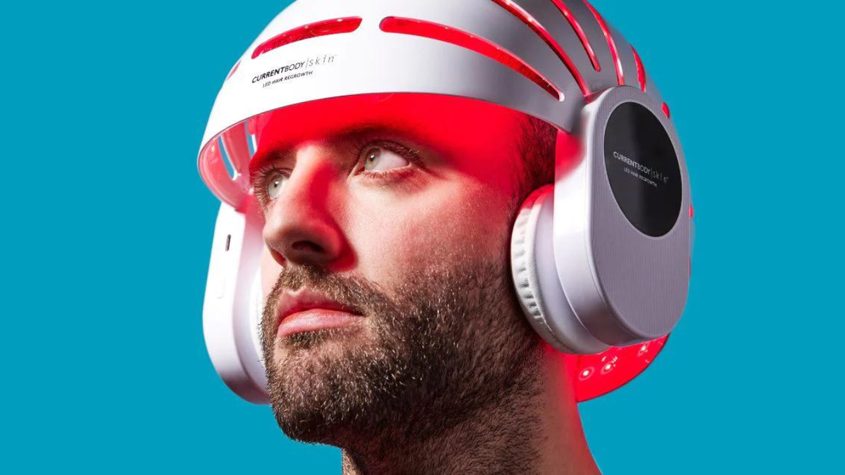 This helmet uses LED light therapy to fast-track hair regrowth, and I'm ...