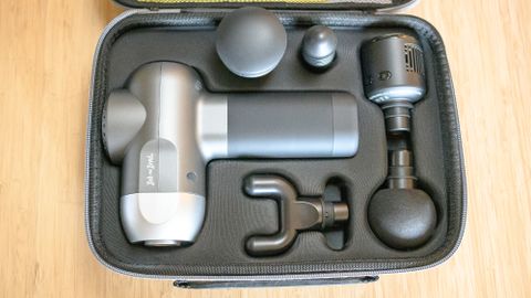 I tried this budget-friendly heated massage gun on my sore muscles – 5 ...