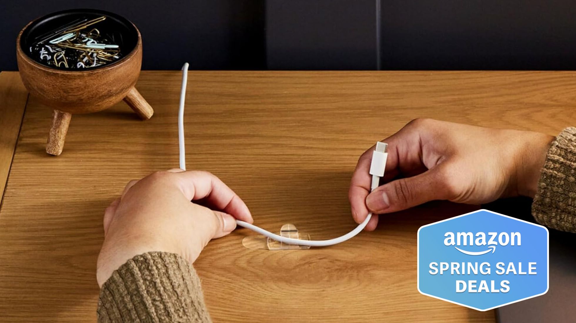 I use these Command strips to organize cables and hang pictures, and ...