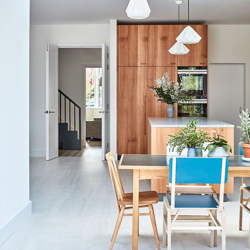 Retro plywood kitchen makeover with blue doors and Corian worktops ...