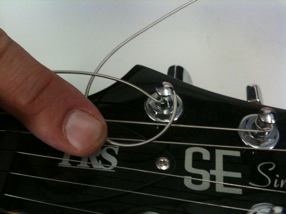 How to Change the Strings on an Electric Guitar — Video | Guitar World