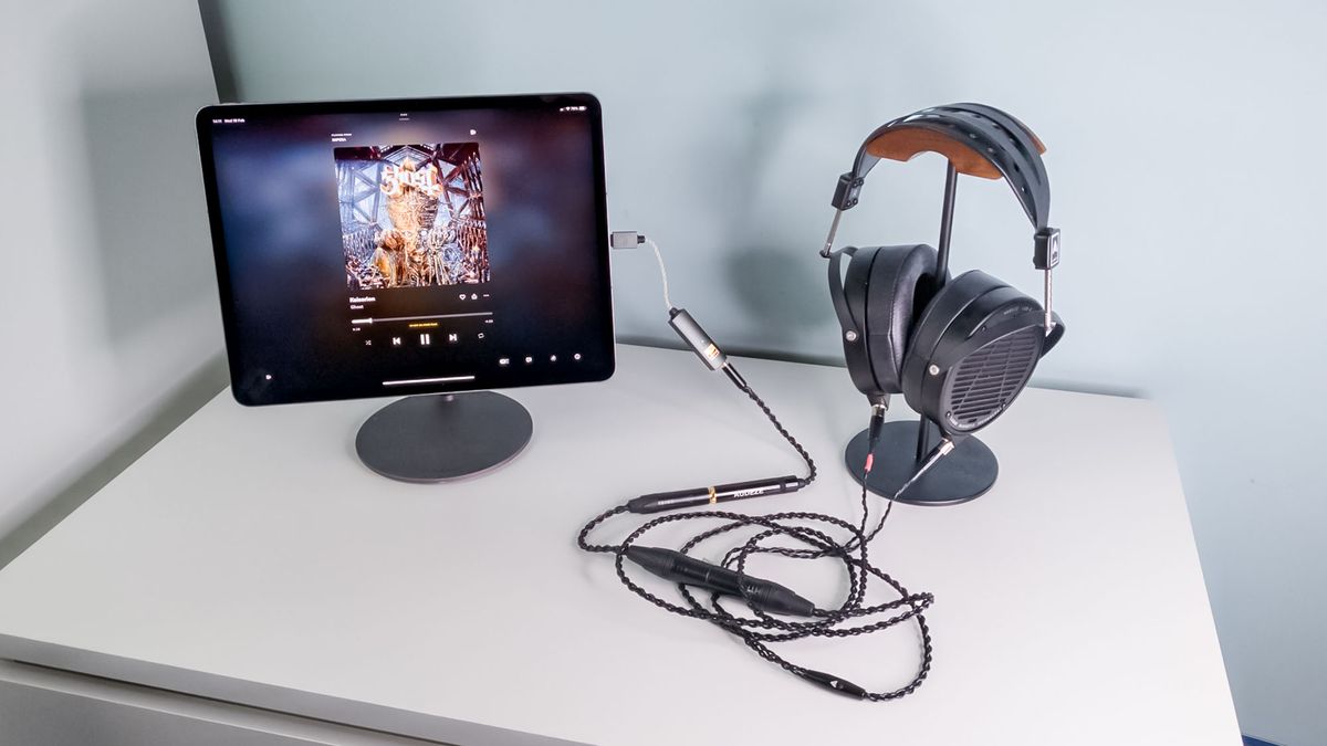 I just tried this USB-C dongle that brings the headphone jack back to ...