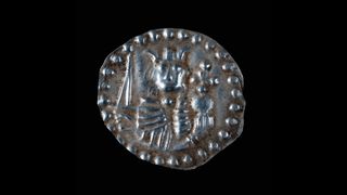 Up to 20,000 coins from Early Middle Ages discovered by man digging for ...